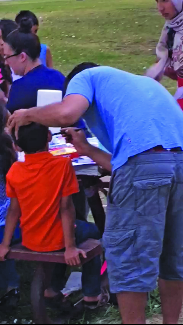 Christian missionaries from California proselytize in Hemlock Park