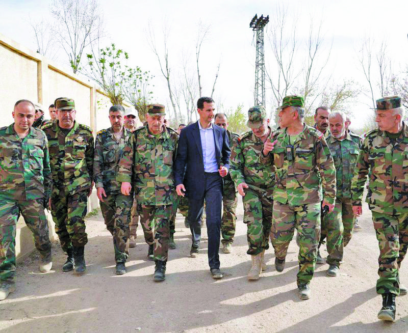 Syria rebels depart eastern Ghouta town on government buses in first ...
