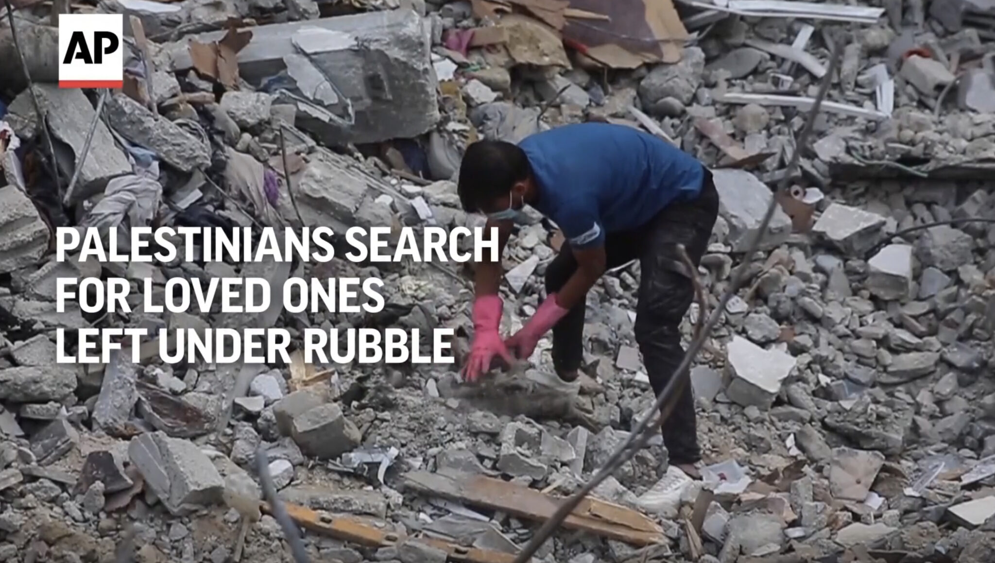 Thousands of bodies lie buried in rubble in Gaza. Families dig to ...